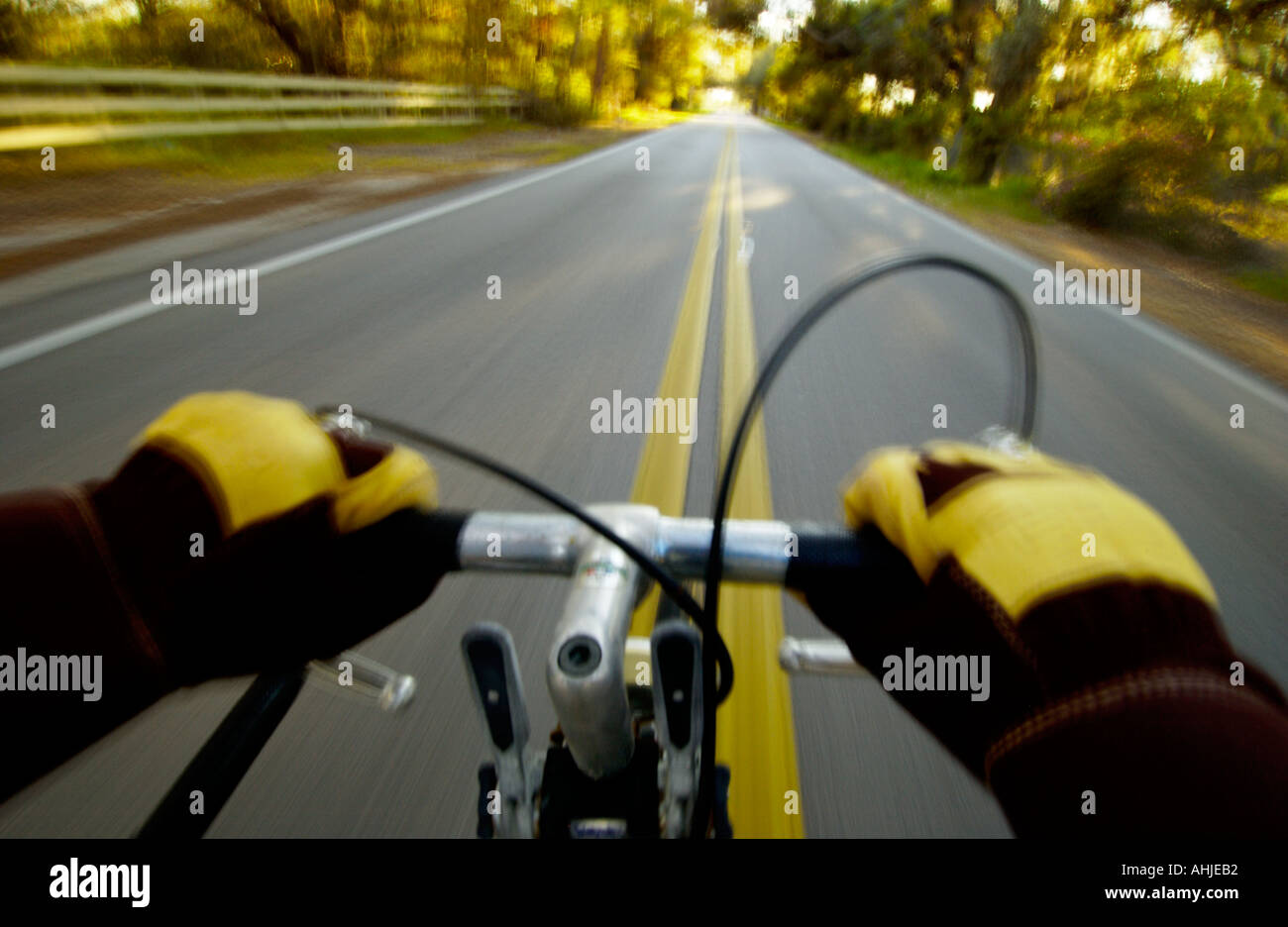 man riding racing bicycle Stock Photo - Alamy