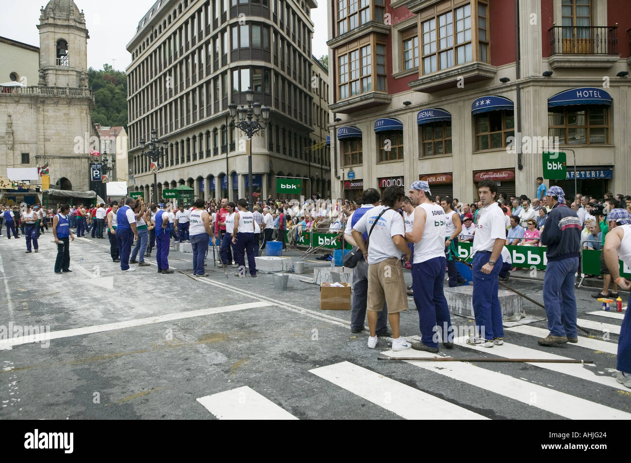 Teams of Basque men compete to chip through blocks of granite during ...