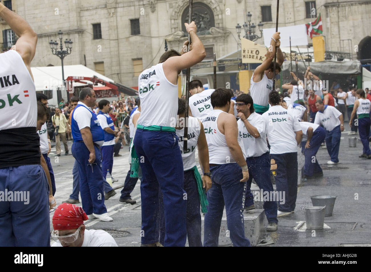 Teams of Basque men compete to chip through blocks of granite during ...