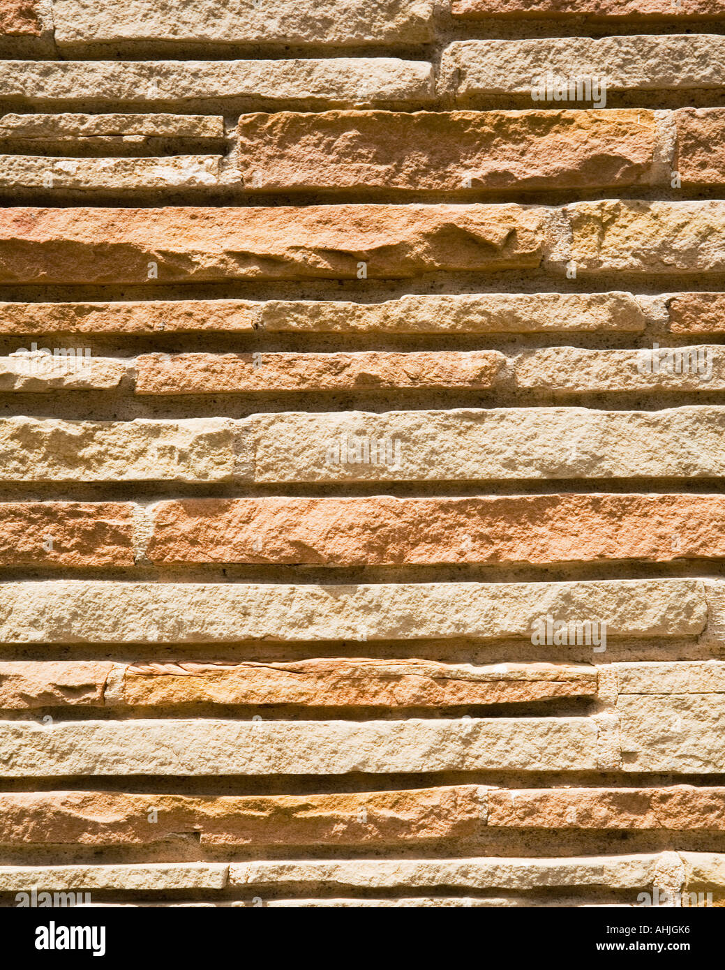 Layered stone wall Stock Photo - Alamy