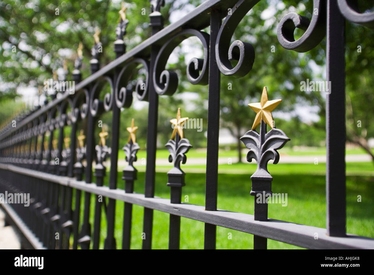 Fence with gold stars Stock Photo - Alamy