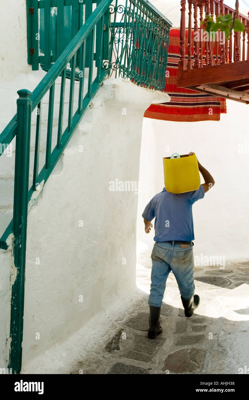 Man working outside house stairs hi-res stock photography and images ...