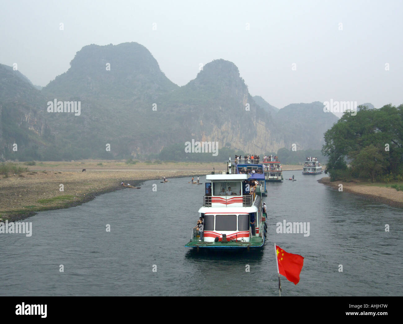 boat convoy on the Li River Stock Photo - Alamy