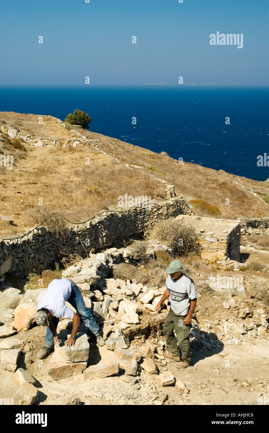 men working on stone path, wall, fence Folegandros Cyclades Greek ...