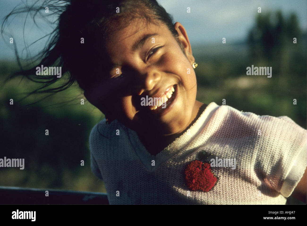 Mexican girl smiling Stock Photo - Alamy