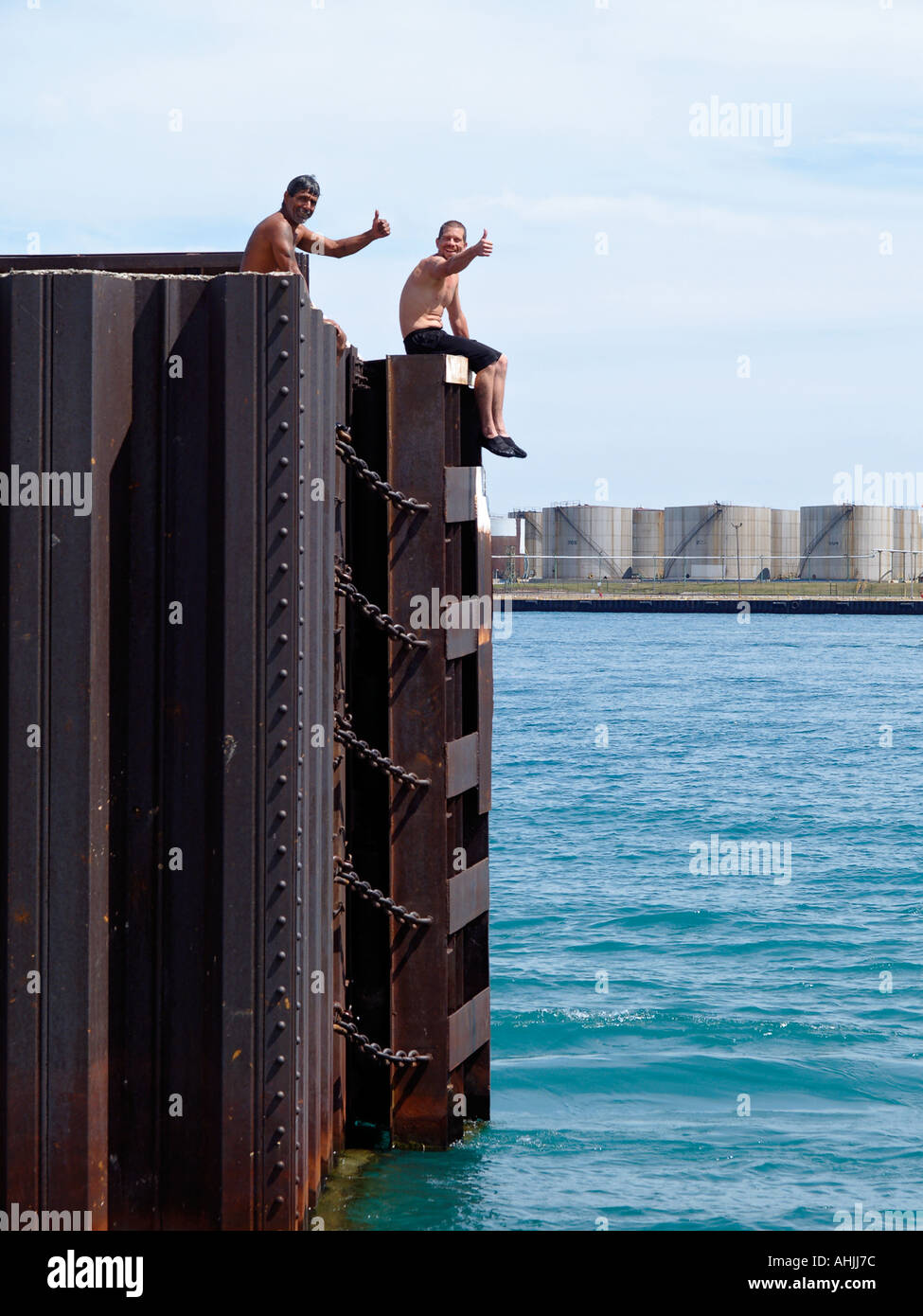 Young men diving off of the old piers at the Port Huron Seaway Terminal ...