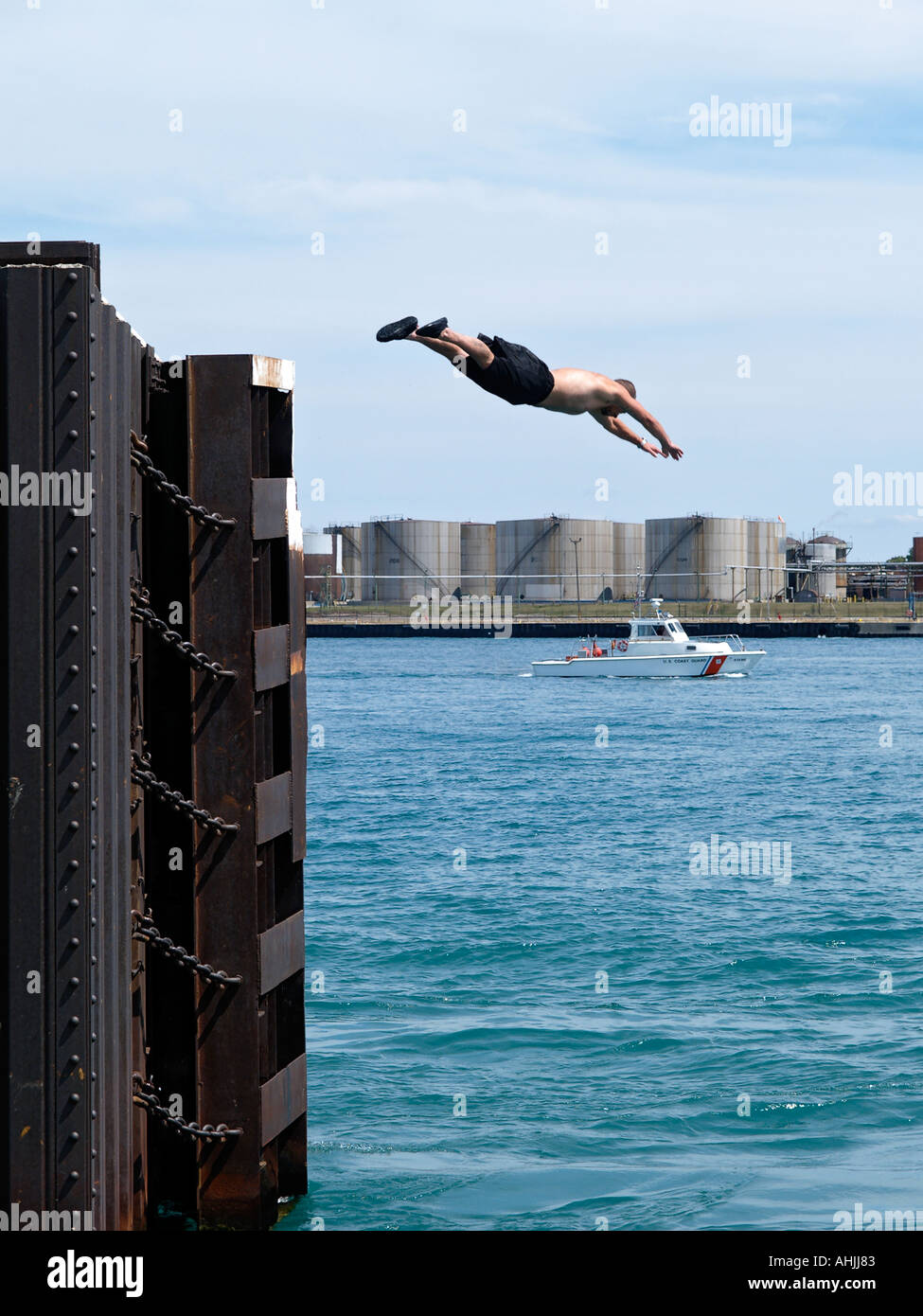 Young men diving off of the old piers at the Port Huron Seaway Terminal ...
