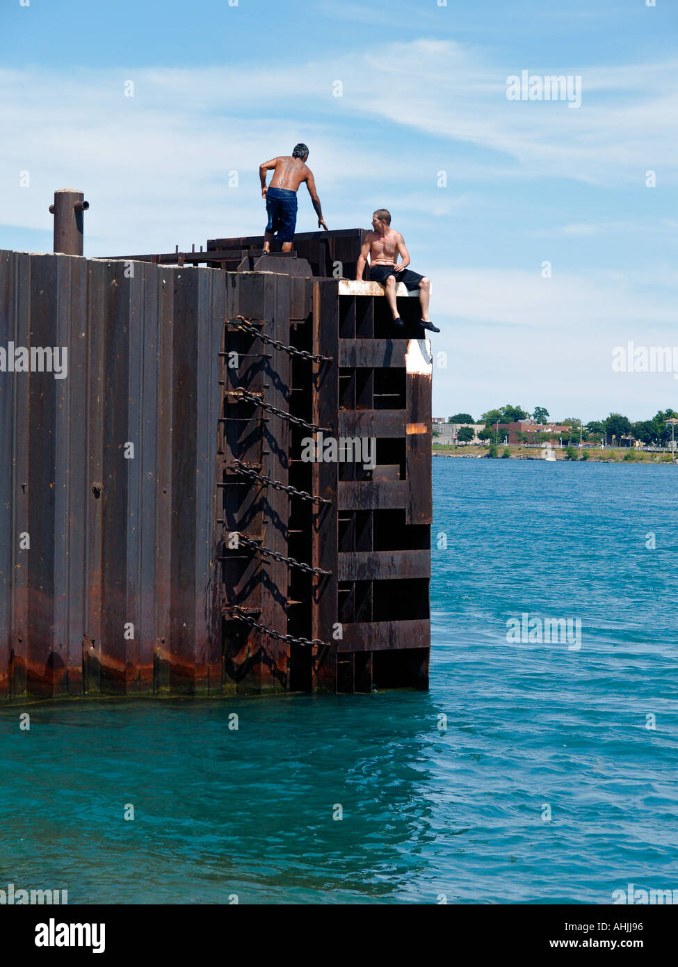 Young men diving off of the old piers at the Port Huron Seaway Terminal ...