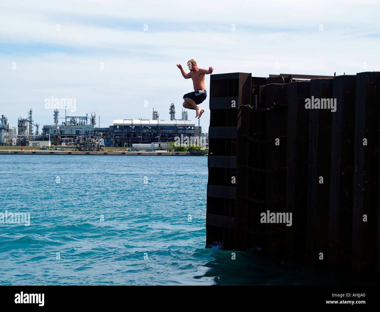 Young men diving off of the old piers at the Port Huron Seaway Terminal ...