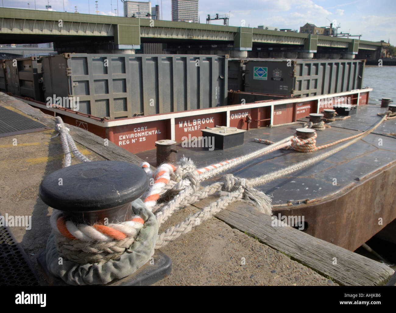 environmental waste barges on River Thames at Cannon Street Bridge ...
