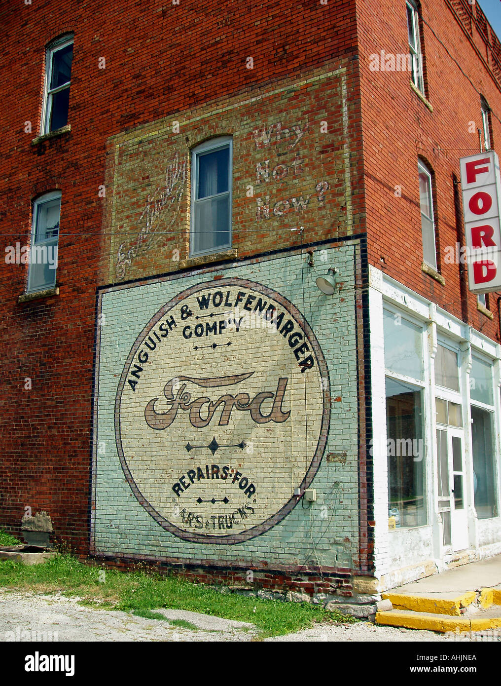 Vintage Building Wall Sign Stock Photo - Alamy