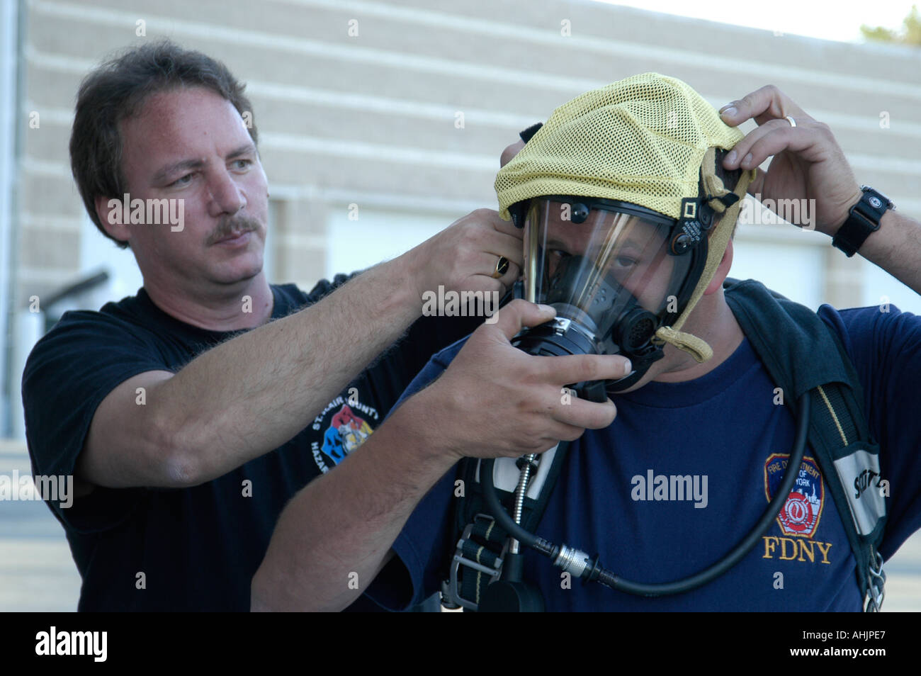 P27 089 HazMat Training, Putting On Oxygen Mask MR Stock Photo - Alamy