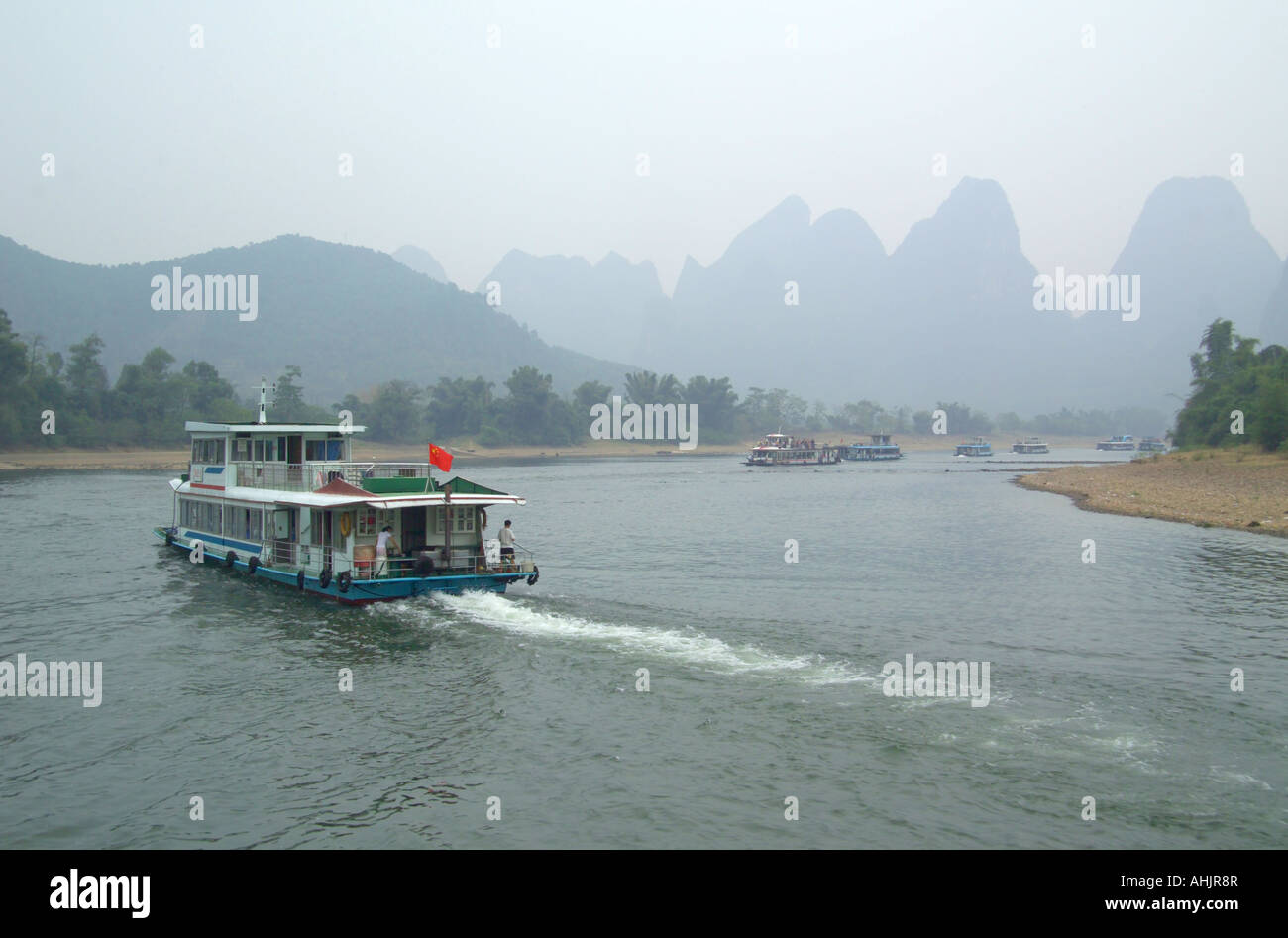 boat convoy on the Li River Stock Photo - Alamy