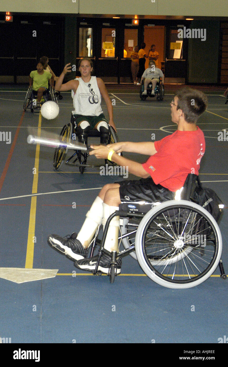 Teen girl pitches during indoor softball at GRWSA Junior Wheelchair ...