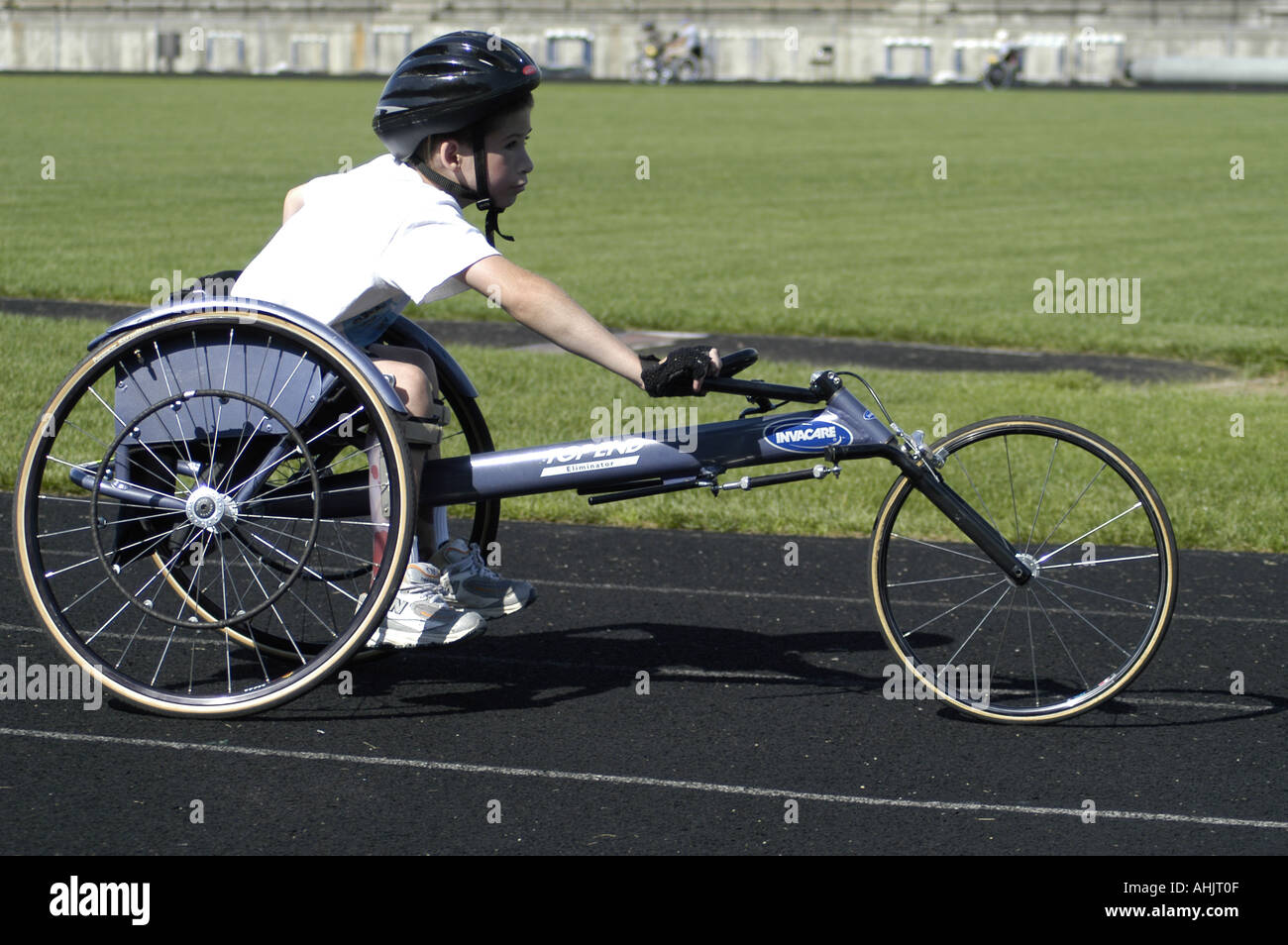 Athlete in racing wheelchair on track at GRWSA Junior Wheelchair Sports ...