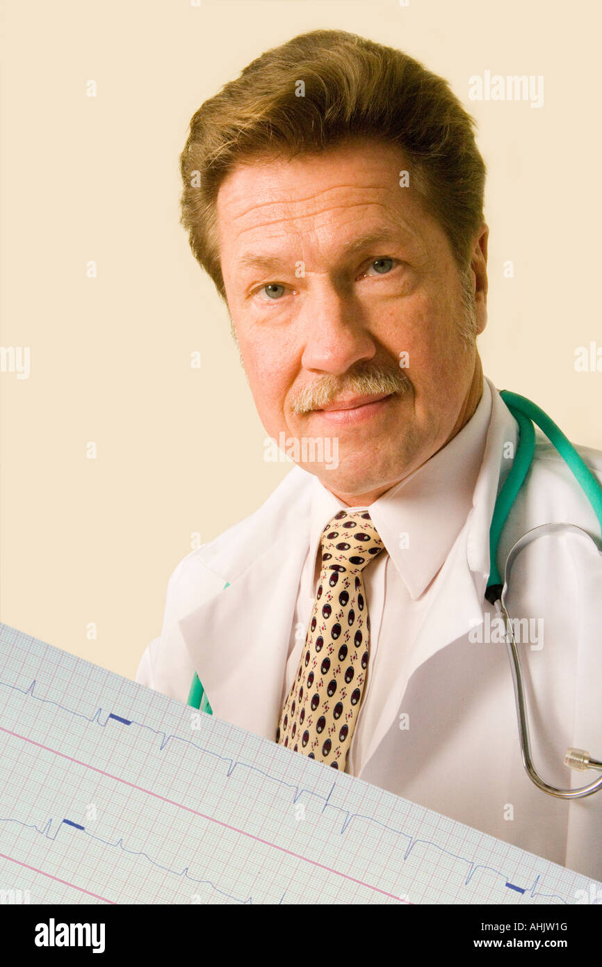 Doctor holding EKG portrait Stock Photo - Alamy