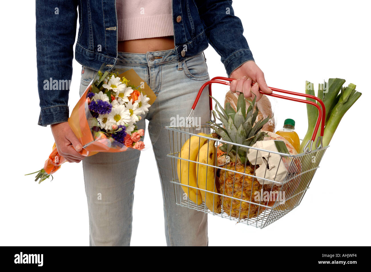 Holding shopping basket hi-res stock photography and images - Alamy