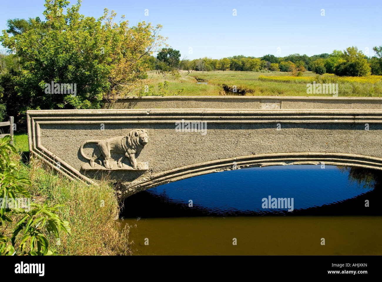 Lion figure on old bridge Stock Photo - Alamy