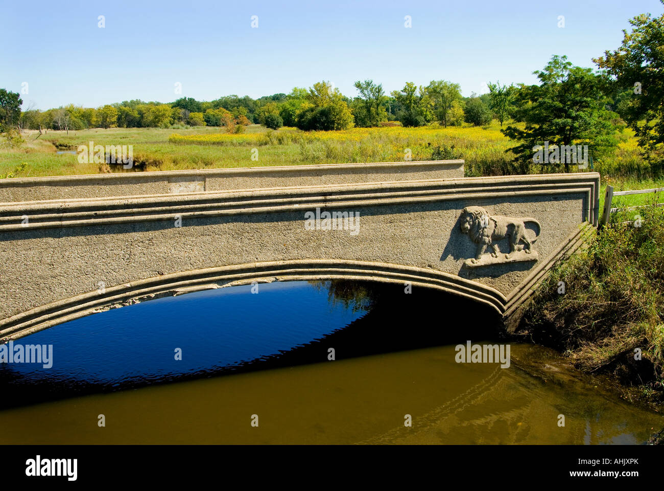 Lion figure on old bridge Stock Photo - Alamy