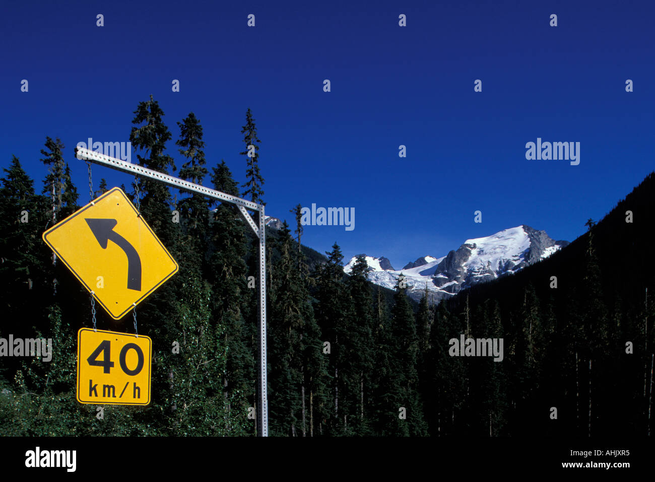 Canada British Columbia Highway 99 road sign and glacier clad Mount ...