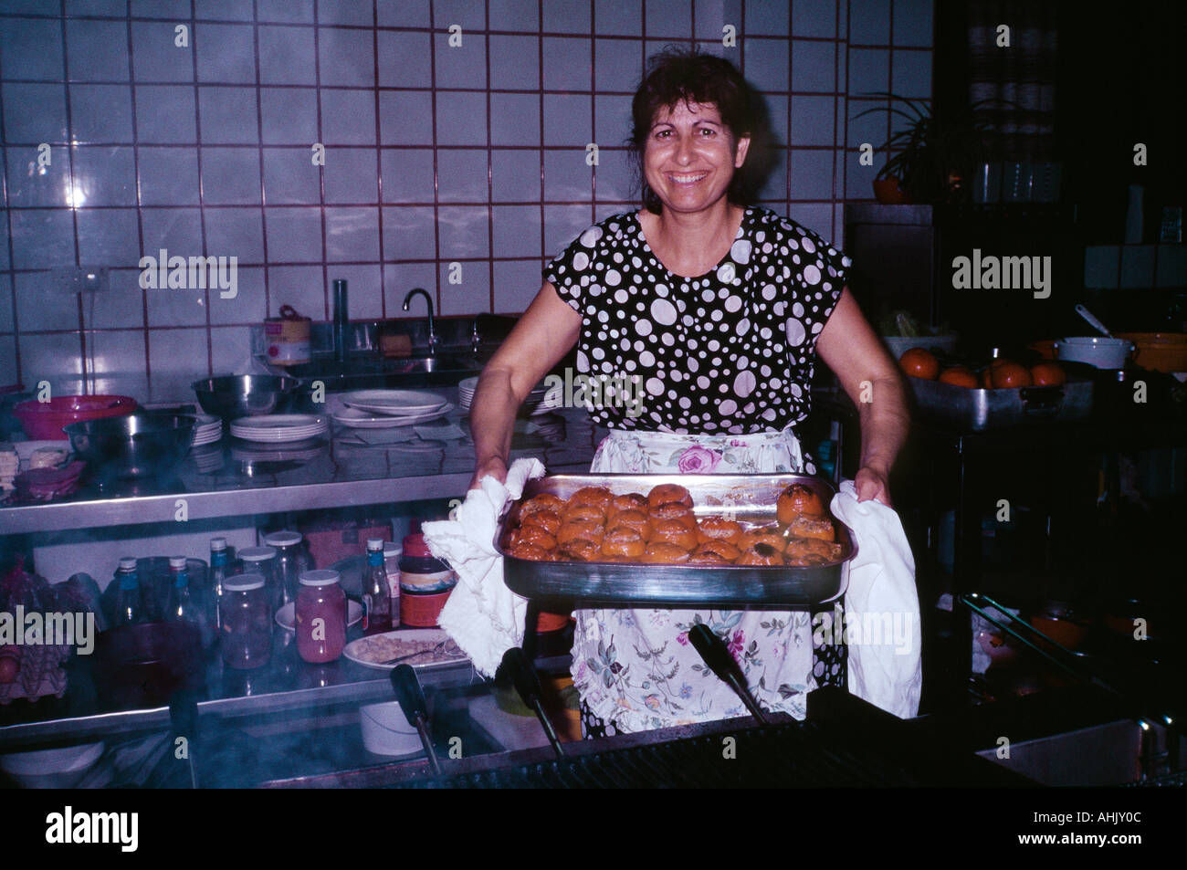 Cyprus Paphos Woman With Stuffed Tomatoes Stock Photo - Alamy