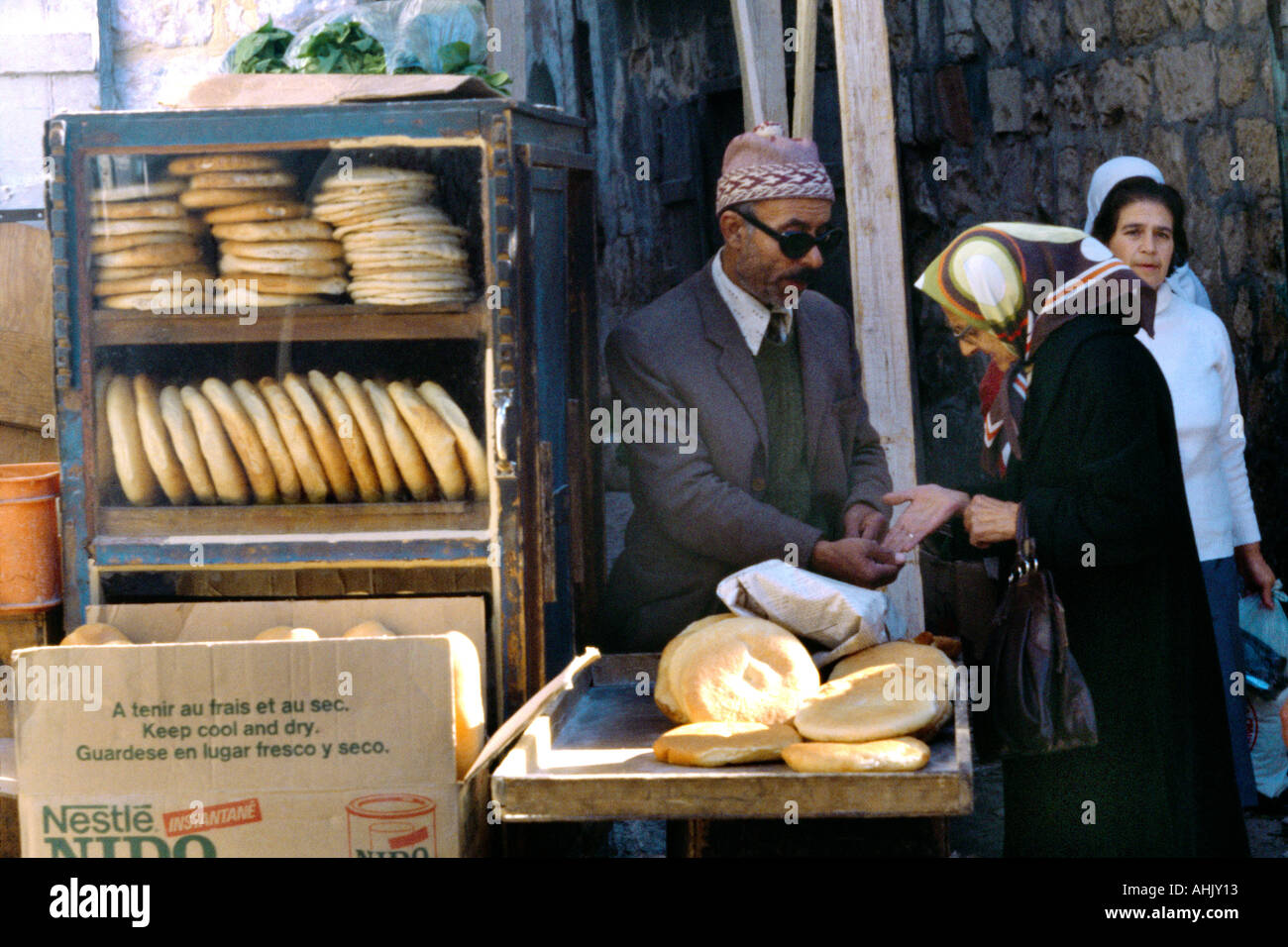 Man selling bread hi-res stock photography and images - Alamy