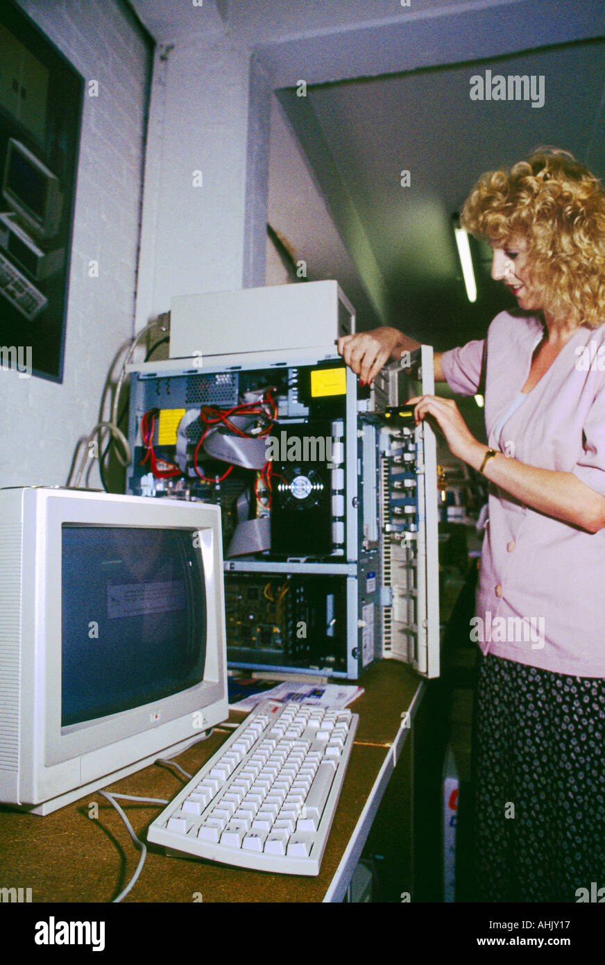 Lady Computer Technician Testing A Computer Tower Stock Photo - Alamy