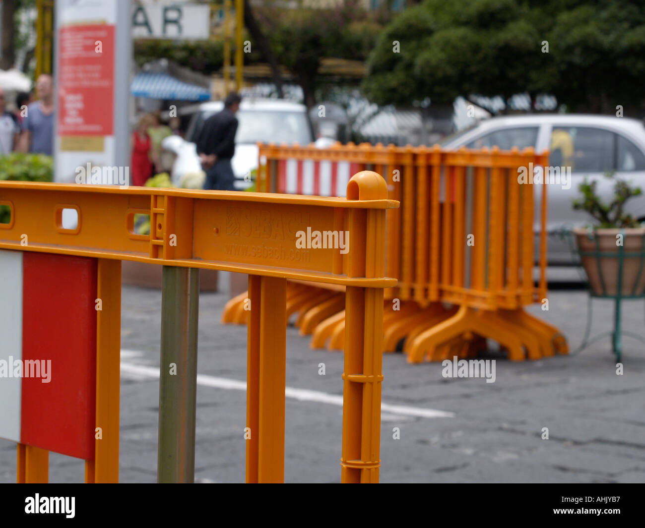orange crowd control barriers Stock Photo - Alamy