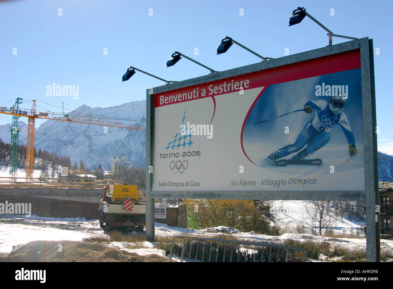 Roadside banner poster for Torino 2006 Olympics with cranes ...