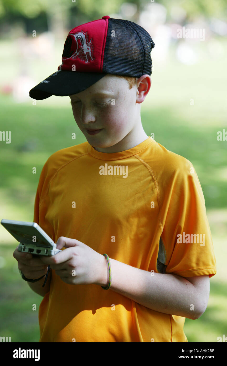 teenager playing electronic game one person child children electronic ...