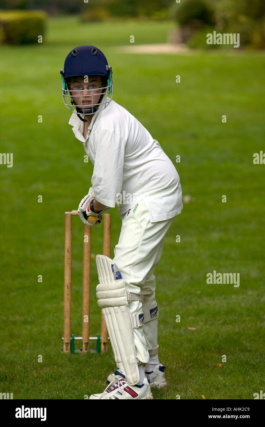 teenage playing cricket Stock Photo - Alamy