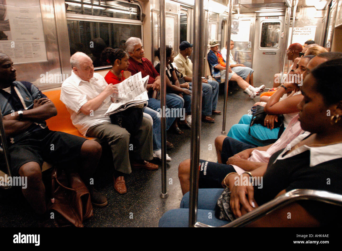 Passengers on a train in the NYC subway Stock Photo - Alamy