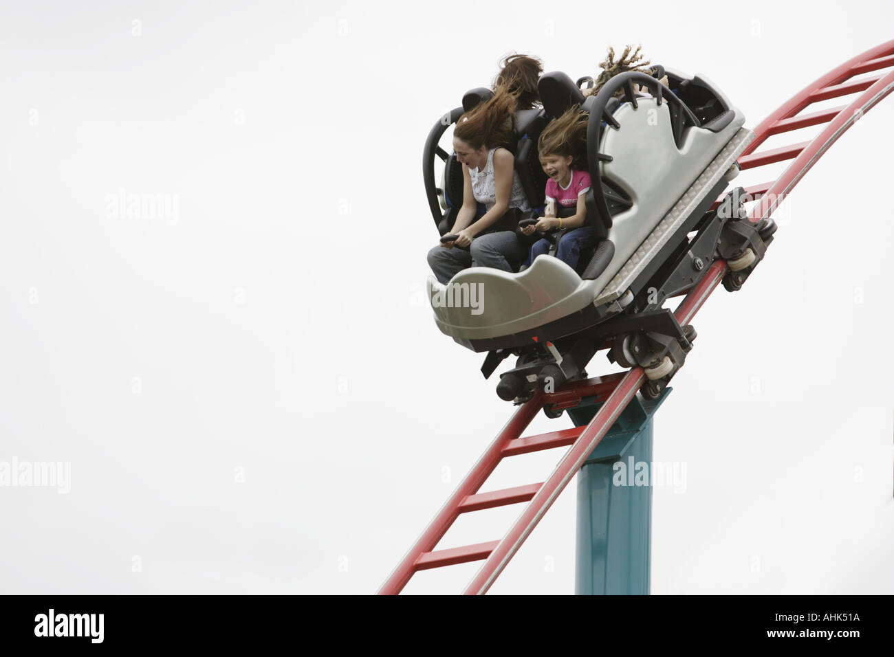 family at amusement park action amusement park ride rides parks ...