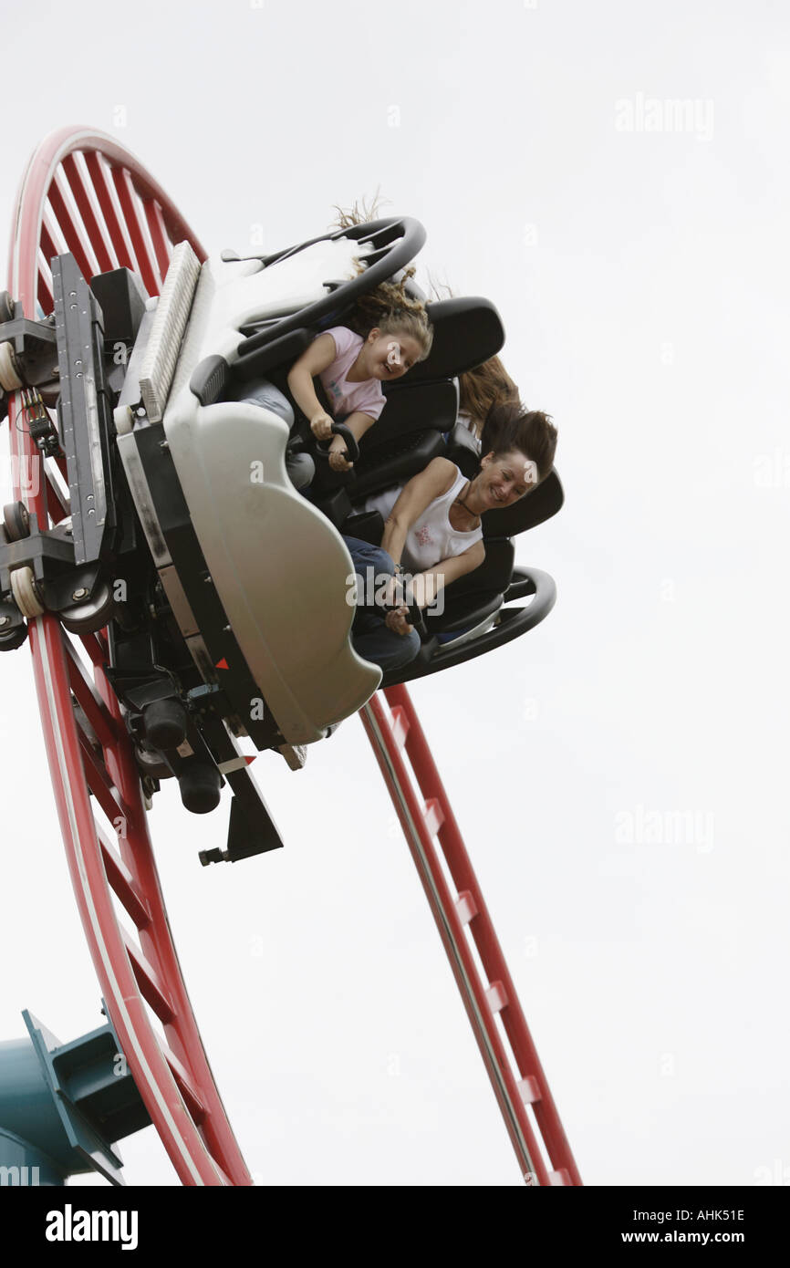 Family at amusement park action amusement park ride rides parks ...
