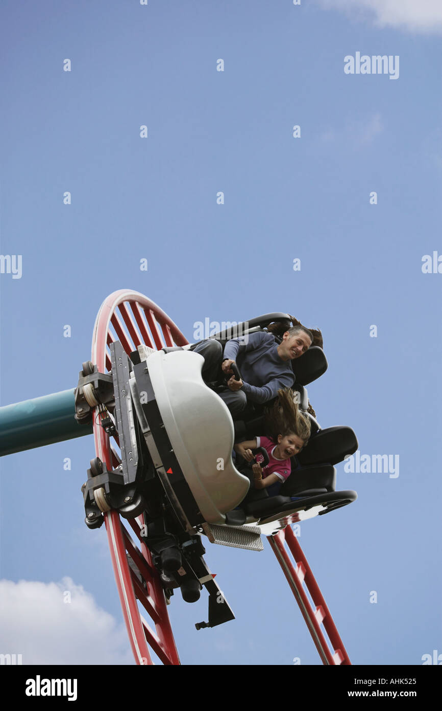 Family at amusement park action amusement park ride rides parks ...