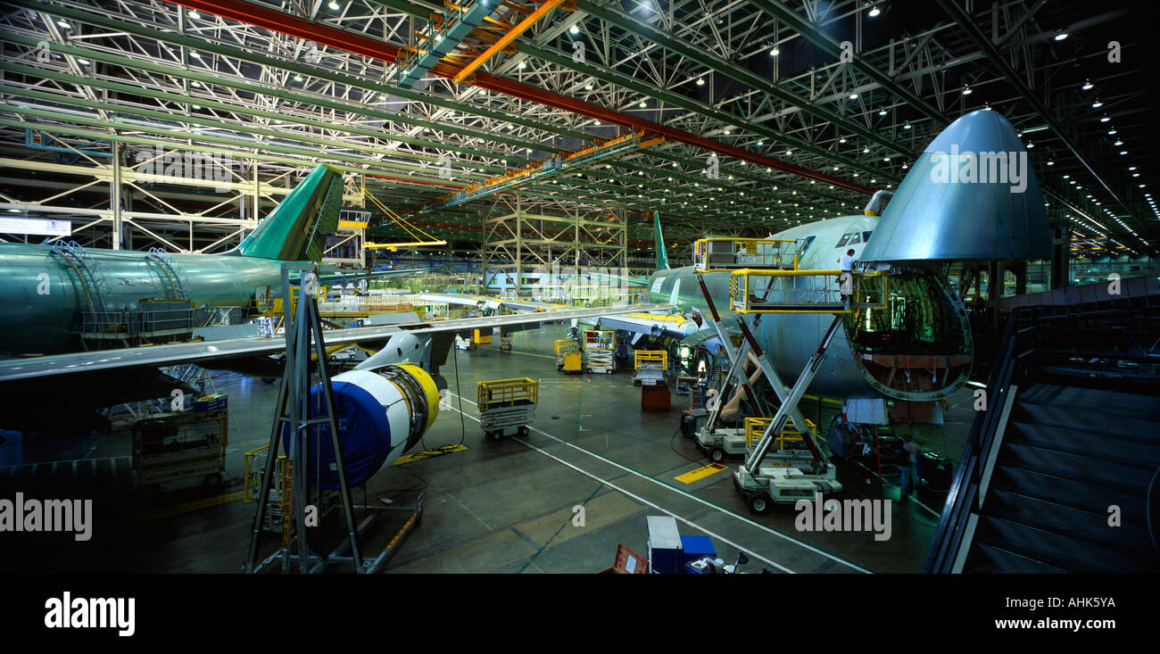 USA Washington Everett Boeing worker inserts rivets into upturned nose ...
