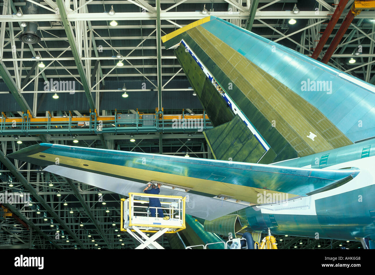 USA Washington Everett Engineer works on tail section of Boeing 747 ...