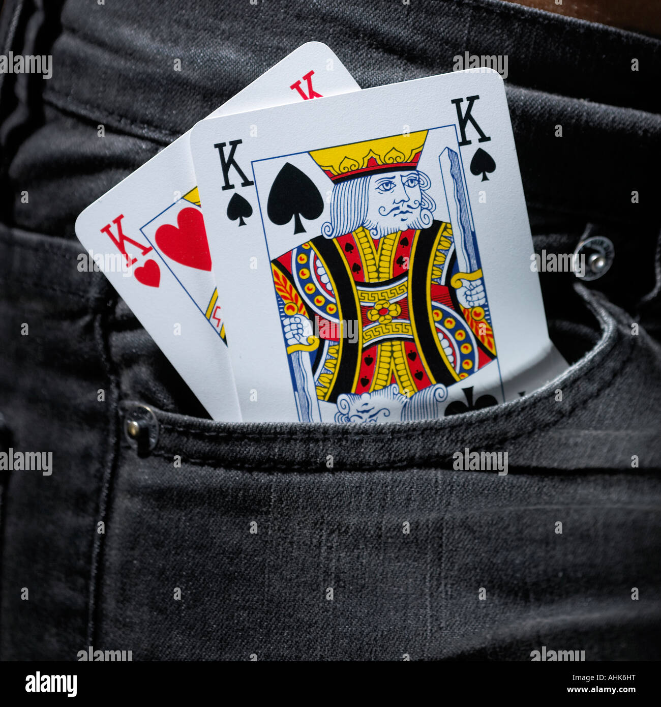 2 kings - playing cards in jeans pocket Stock Photo - Alamy