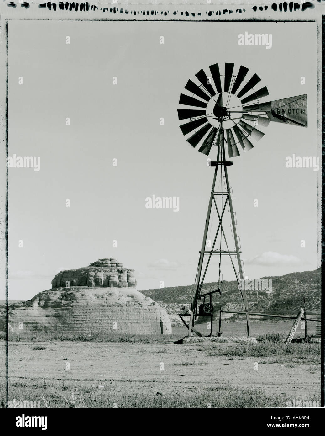 White church black windmill hi-res stock photography and images - Alamy