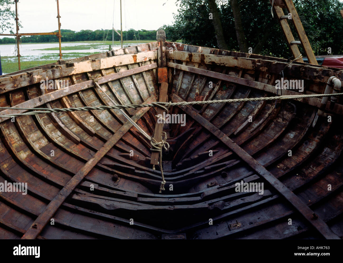 The bare skeleton of a classic wooden boat Stock Photo - Alamy
