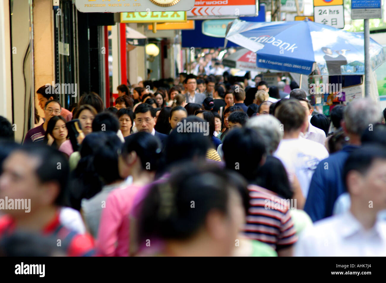 Crowded Pedestrian Sidewalk During Lunchtime Rush in Hong Kong, China ...