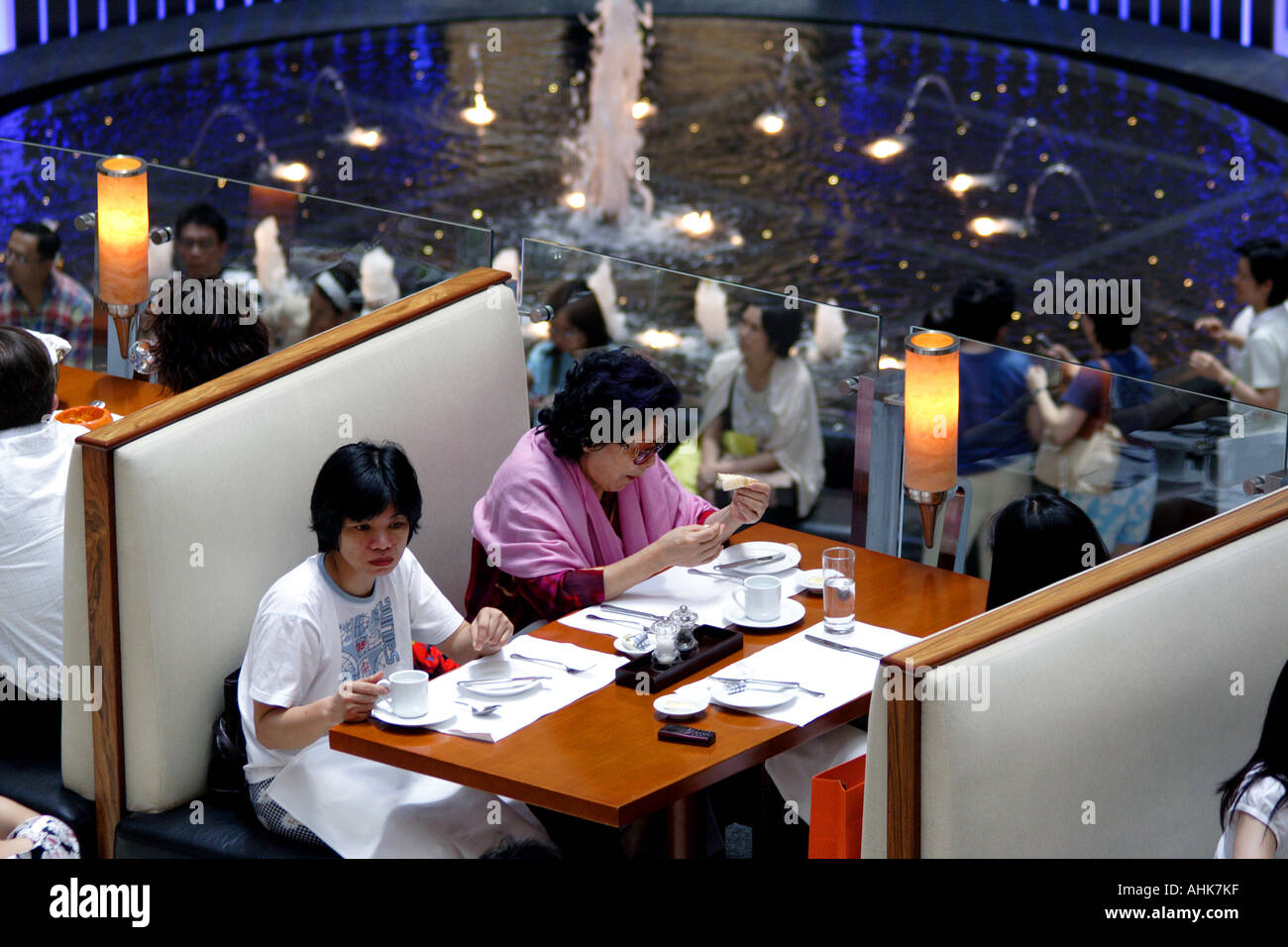 Chinese People Dining Inside a Fancy Open Air Mall Restaurant, Central ...