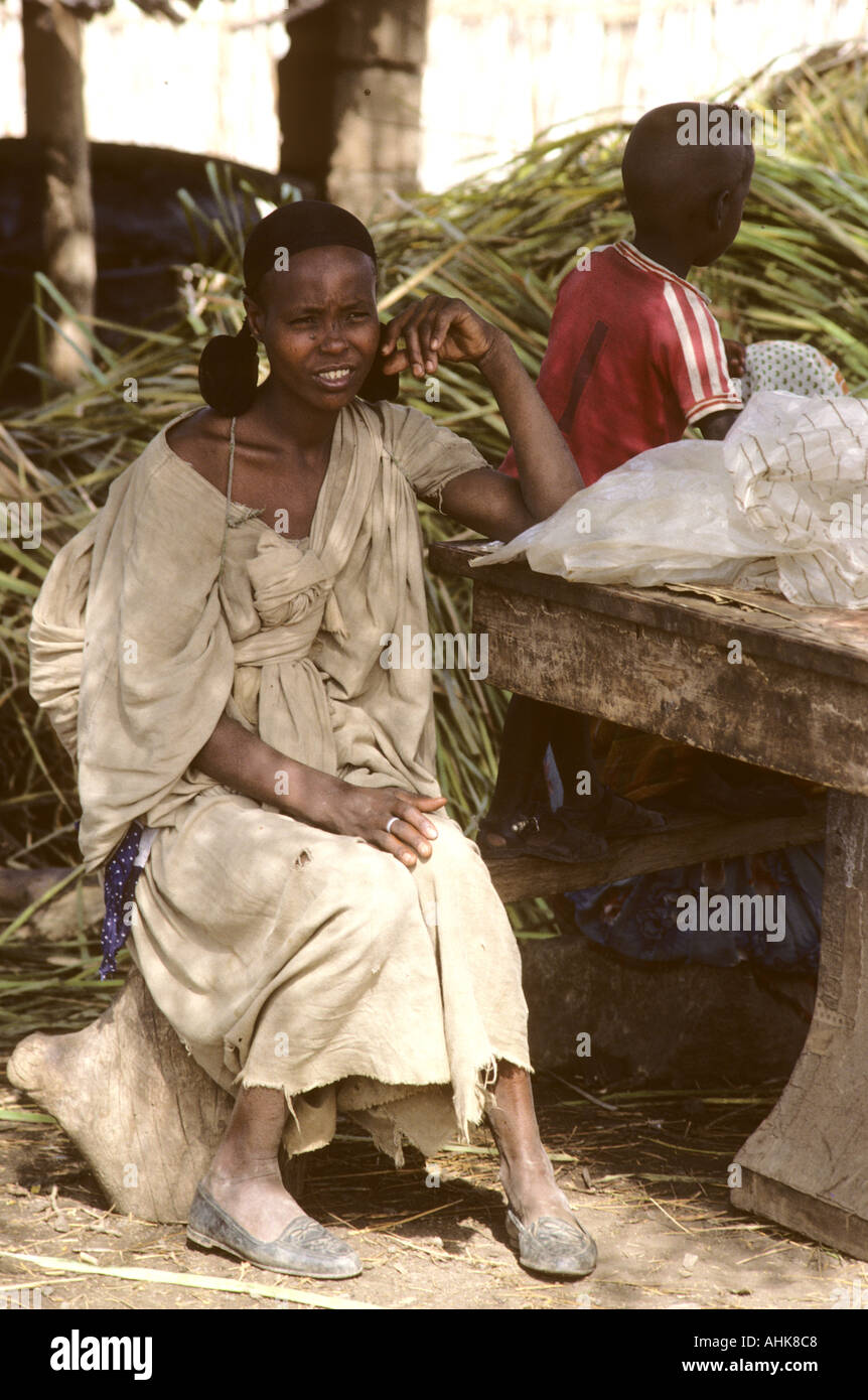 Woman in a resettlement camp Ethiopia Stock Photo - Alamy
