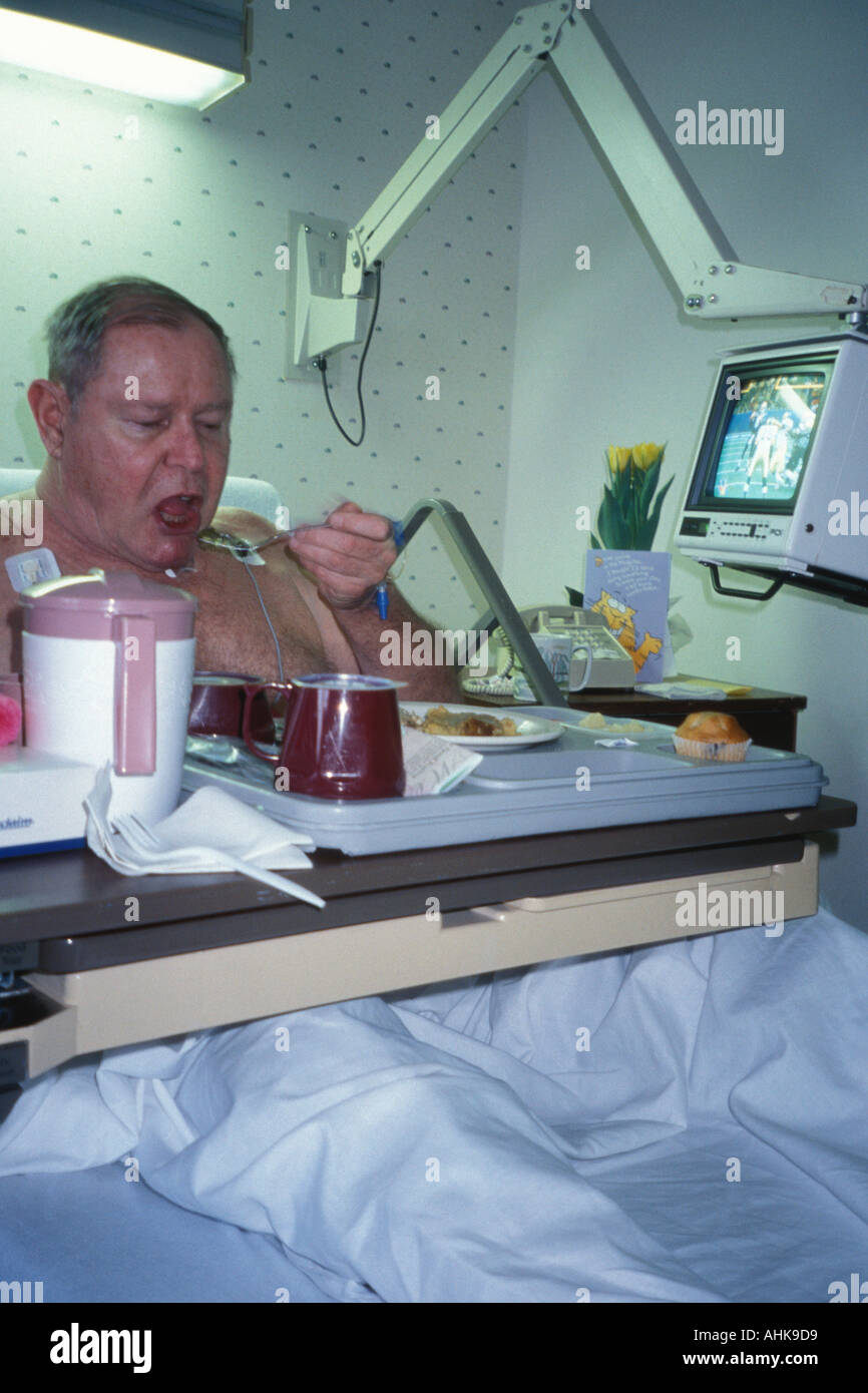 Hospital patient watching tv in bed hi-res stock photography and images ...