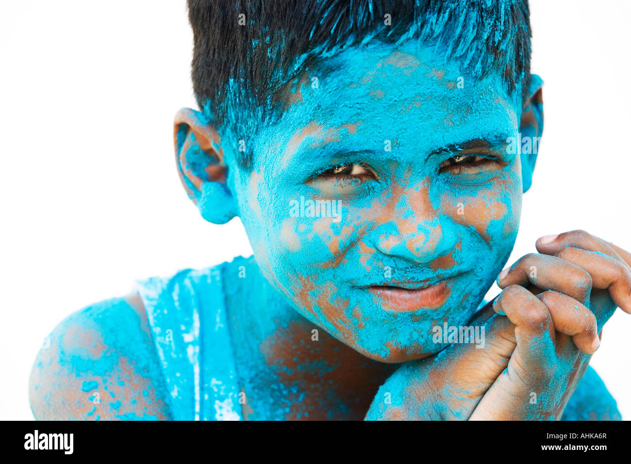 Indian boy covered in blue powder. India Stock Photo - Alamy