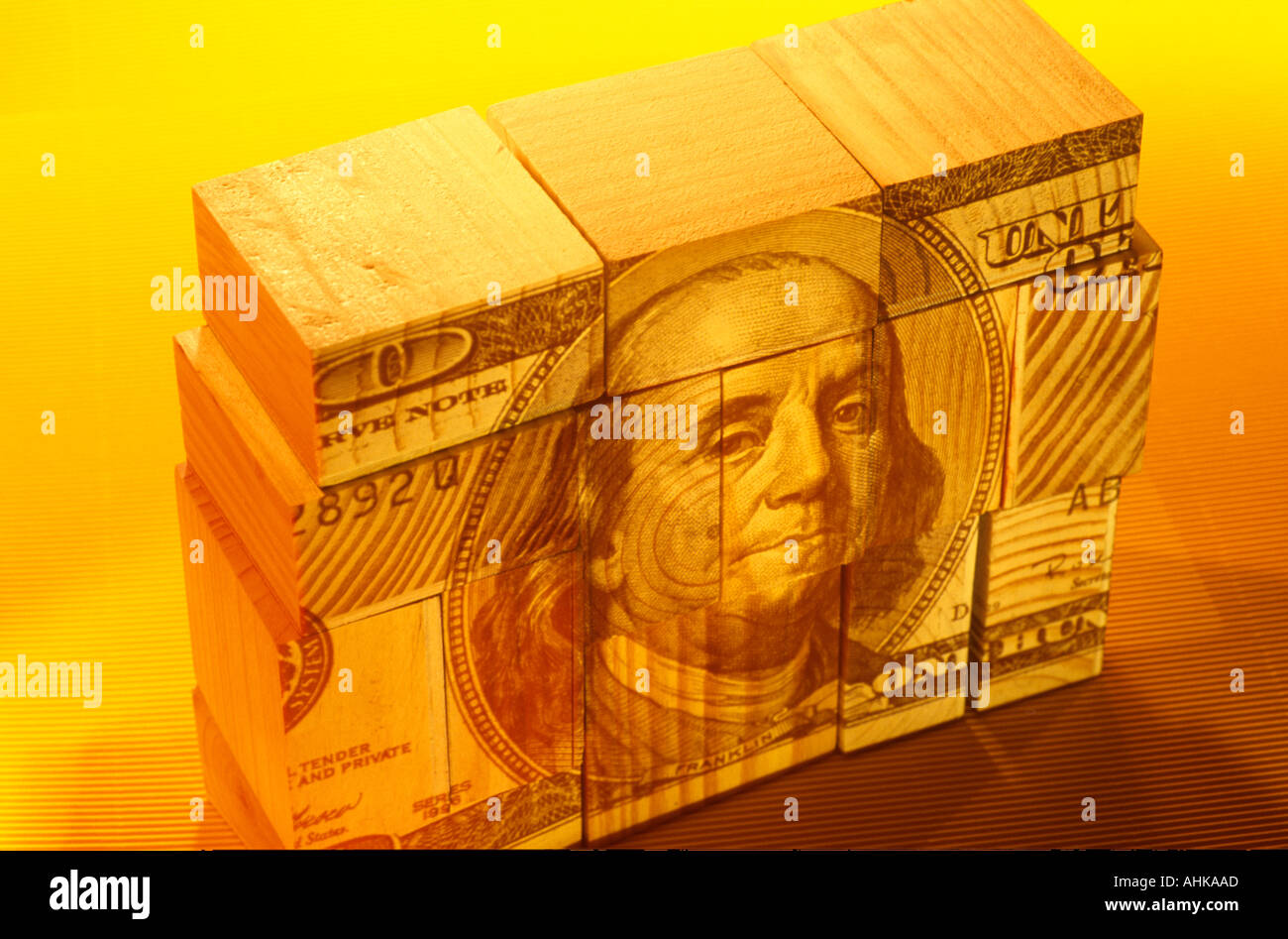 Money building blocks hi-res stock photography and images - Alamy