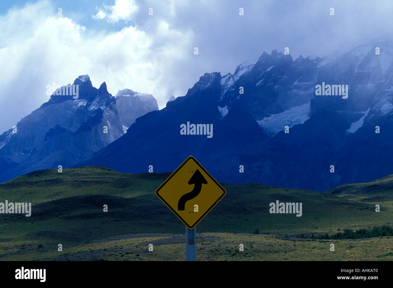 Chile Torres del Paine National Park Winding road sign and Cerro Paine ...