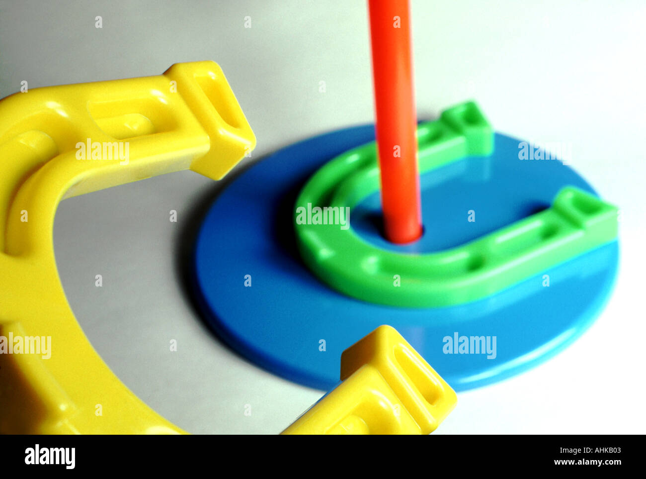 Plastic toy horseshoes Stock Photo - Alamy