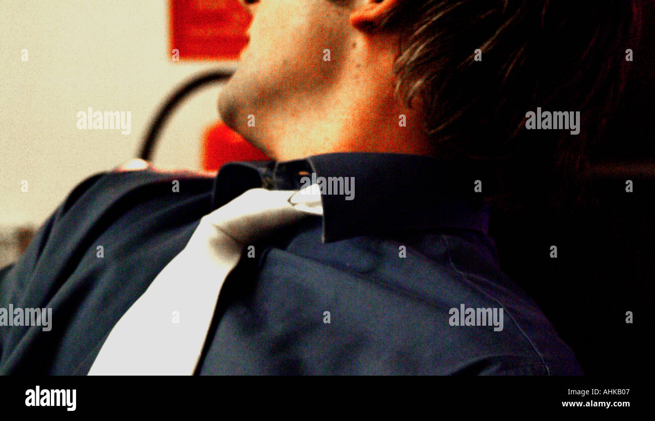 Young man staring away from camera Stock Photo - Alamy