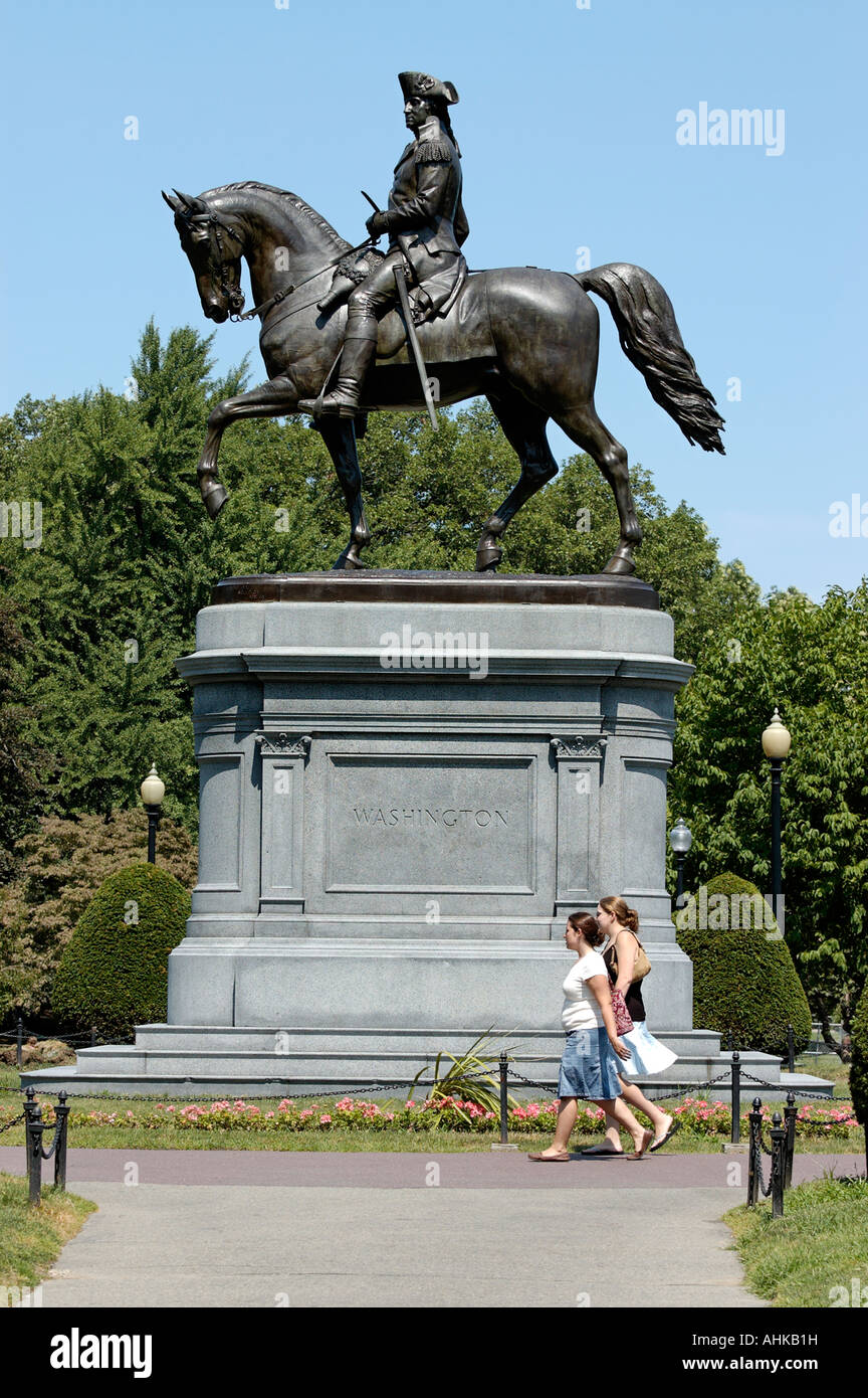 Two women walk by statue of George Washington in Public Gardens Boston ...
